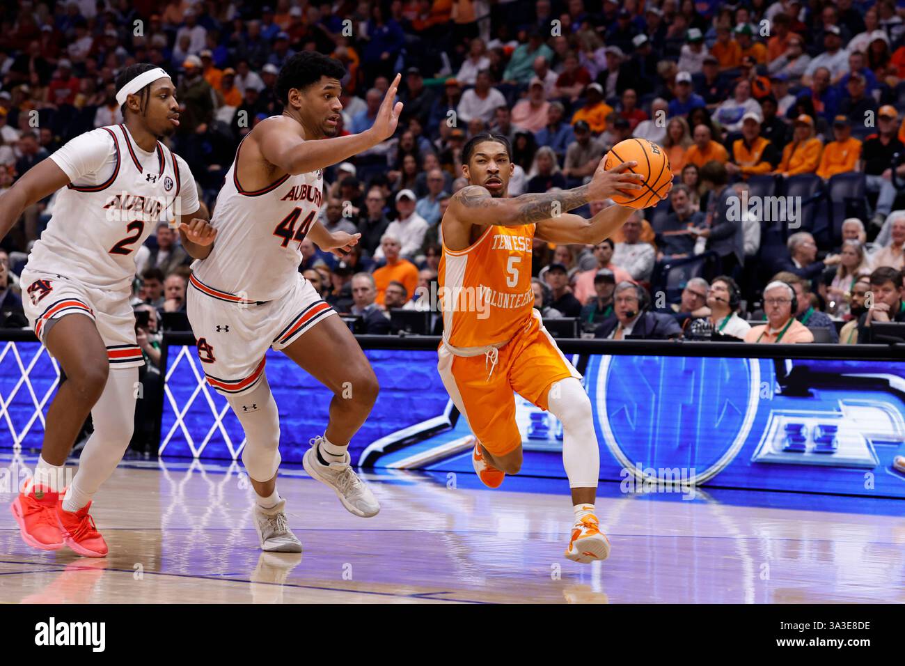 NASHVILLE, TN - MARCH 15: Tennessee Volunteers guard Zakai Zeigler (5) drives to the basket ...