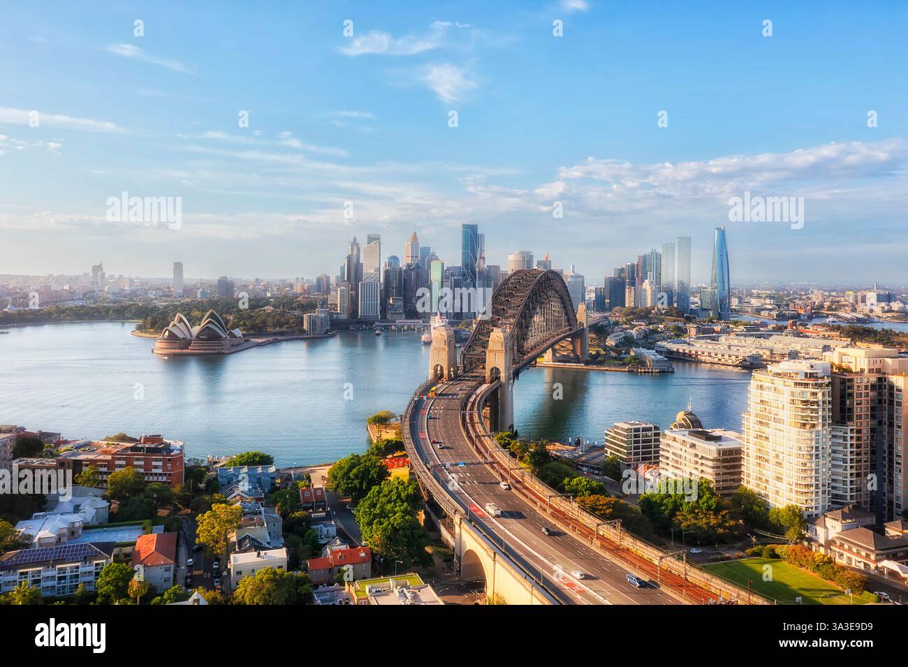 Harbour waterfront of City of Sydney from North Shore over highway and ...