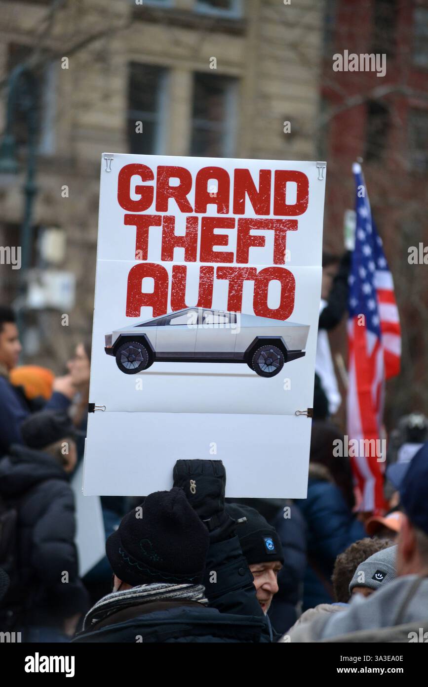 Anti-Elon Musk sign at a Stop the Cuts rally against DOGE cuts to ...