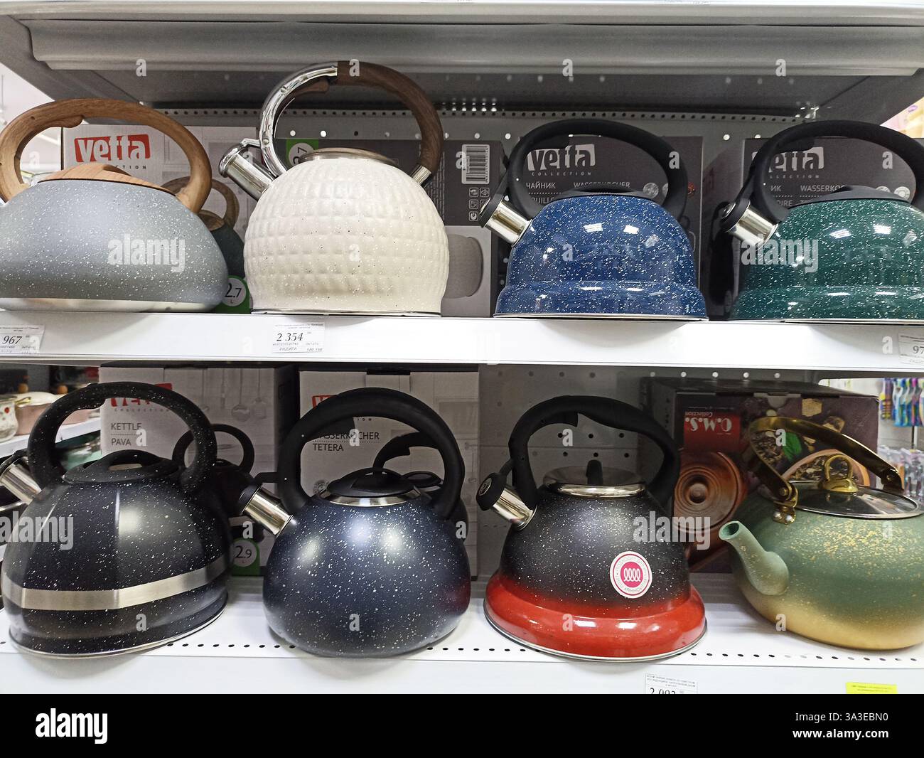 Variety of kettles on display in a store, featuring different designs ...
