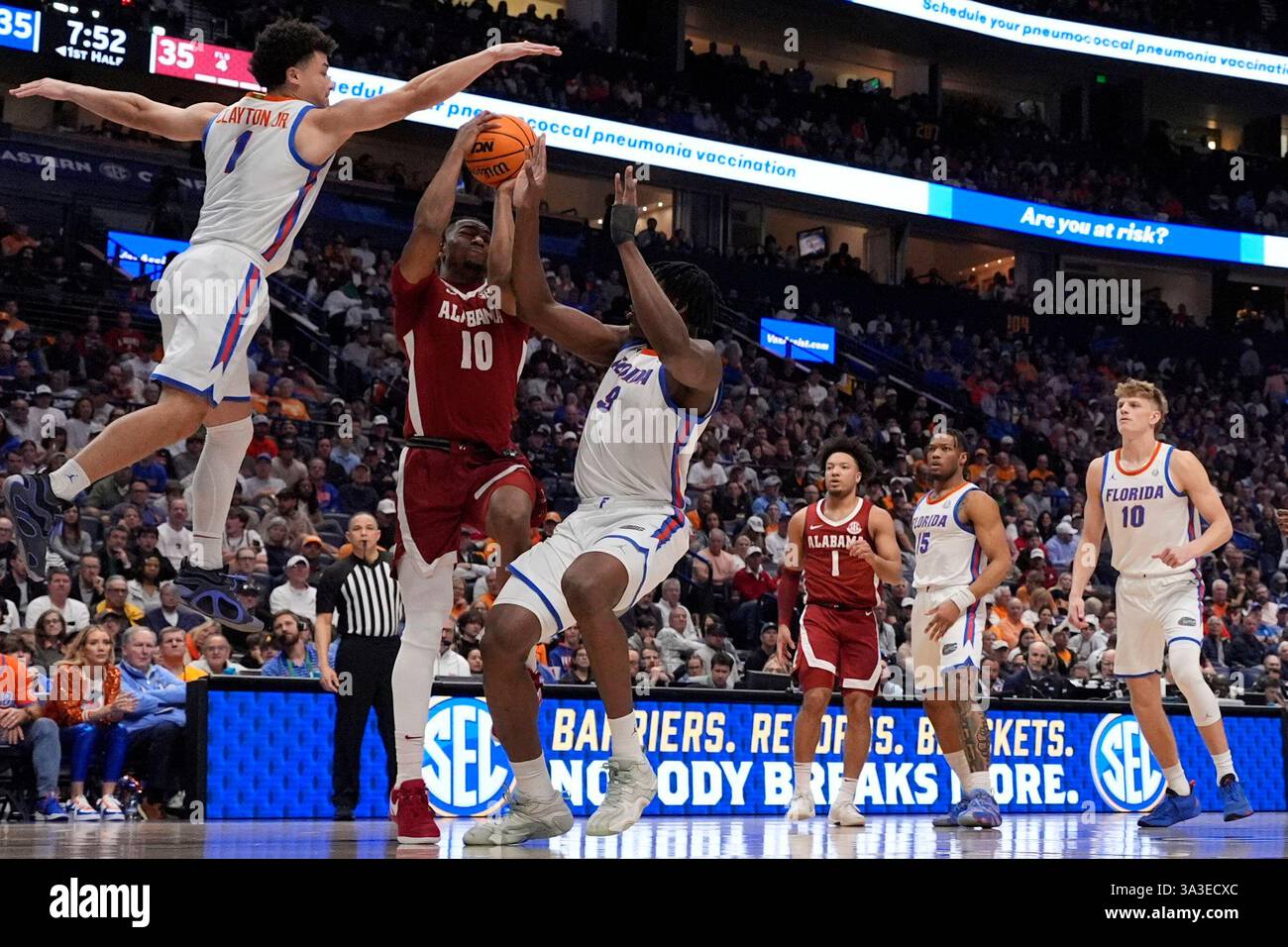 during the first half of an NCAA college basketball game in the ...