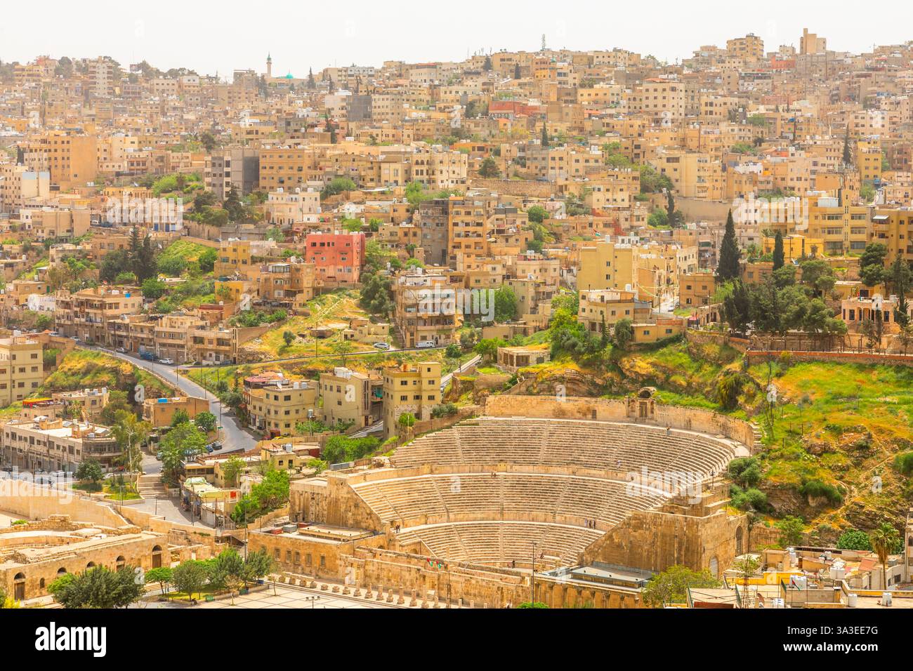 Lots of residential houses on the hills with ancient roman amphitheater ...
