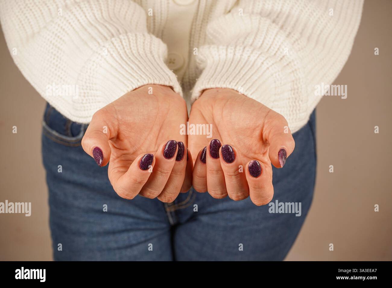 Two palms are placed side by side, creating a balanced and harmonious ...