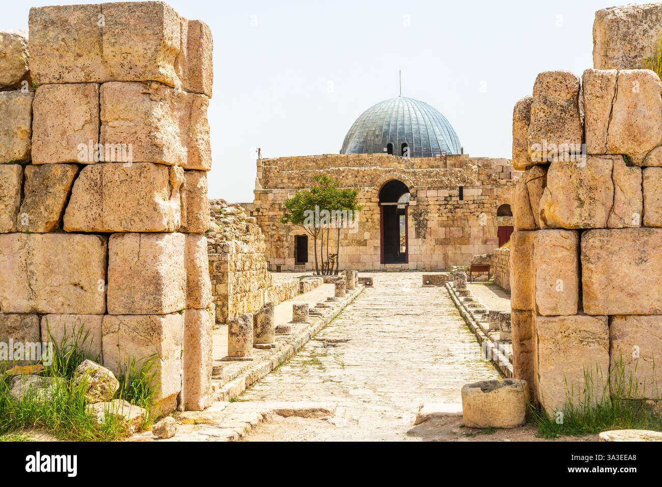 The Dome of Umayyad Palace mosque with stone walls in the foreground ...