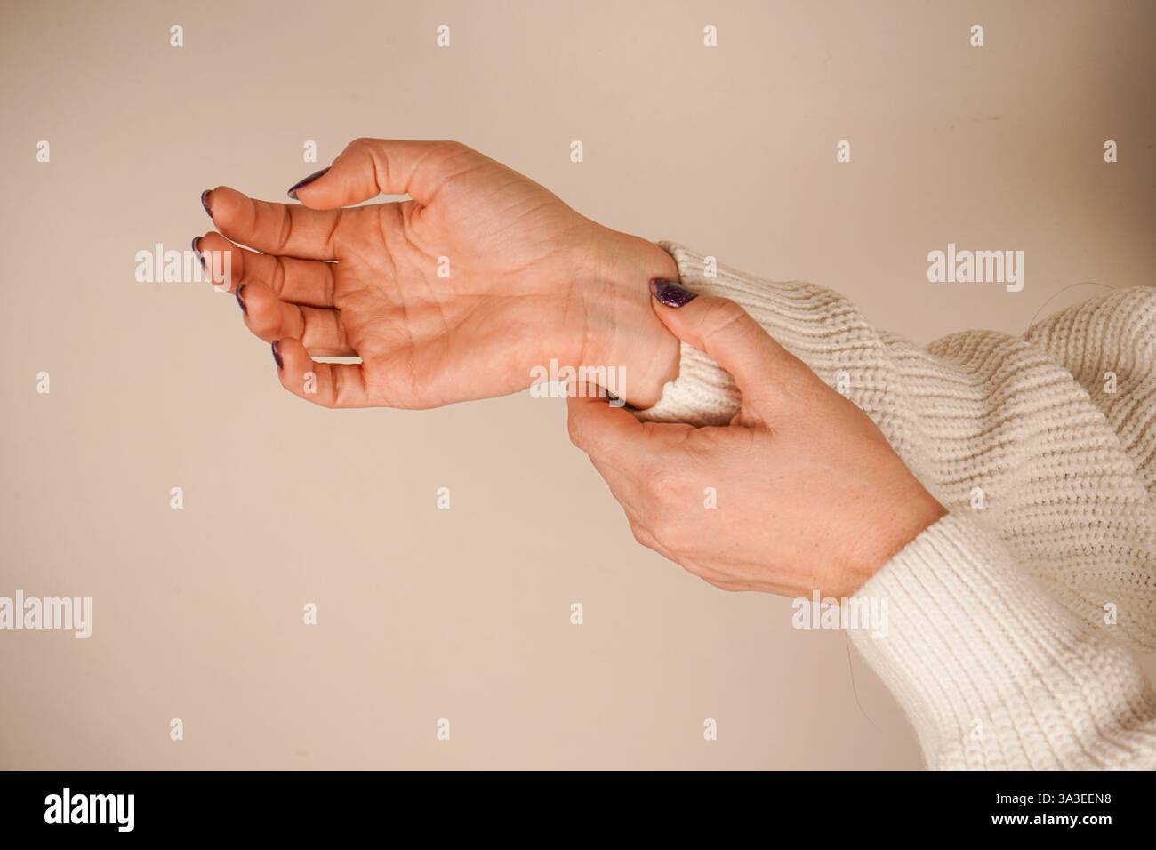 One hand grasps the wrist of the other in a gesture of union. This pose ...