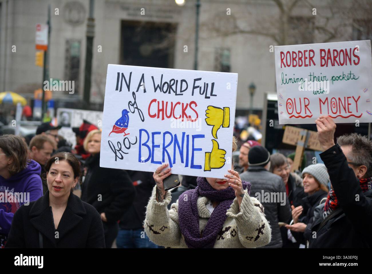 Anti-Chuck Schumer sign at a Stop the Cuts rally against DOGE cuts to ...