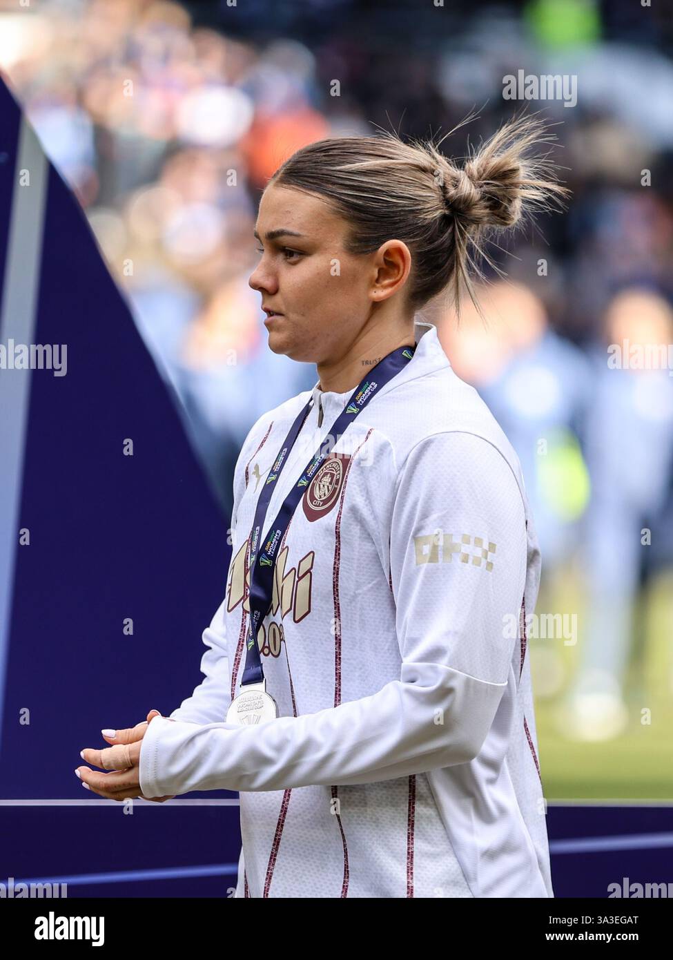 Derby, UK. 15th Mar, 2025. Laura Wienroither (13 Manchester City) with ...