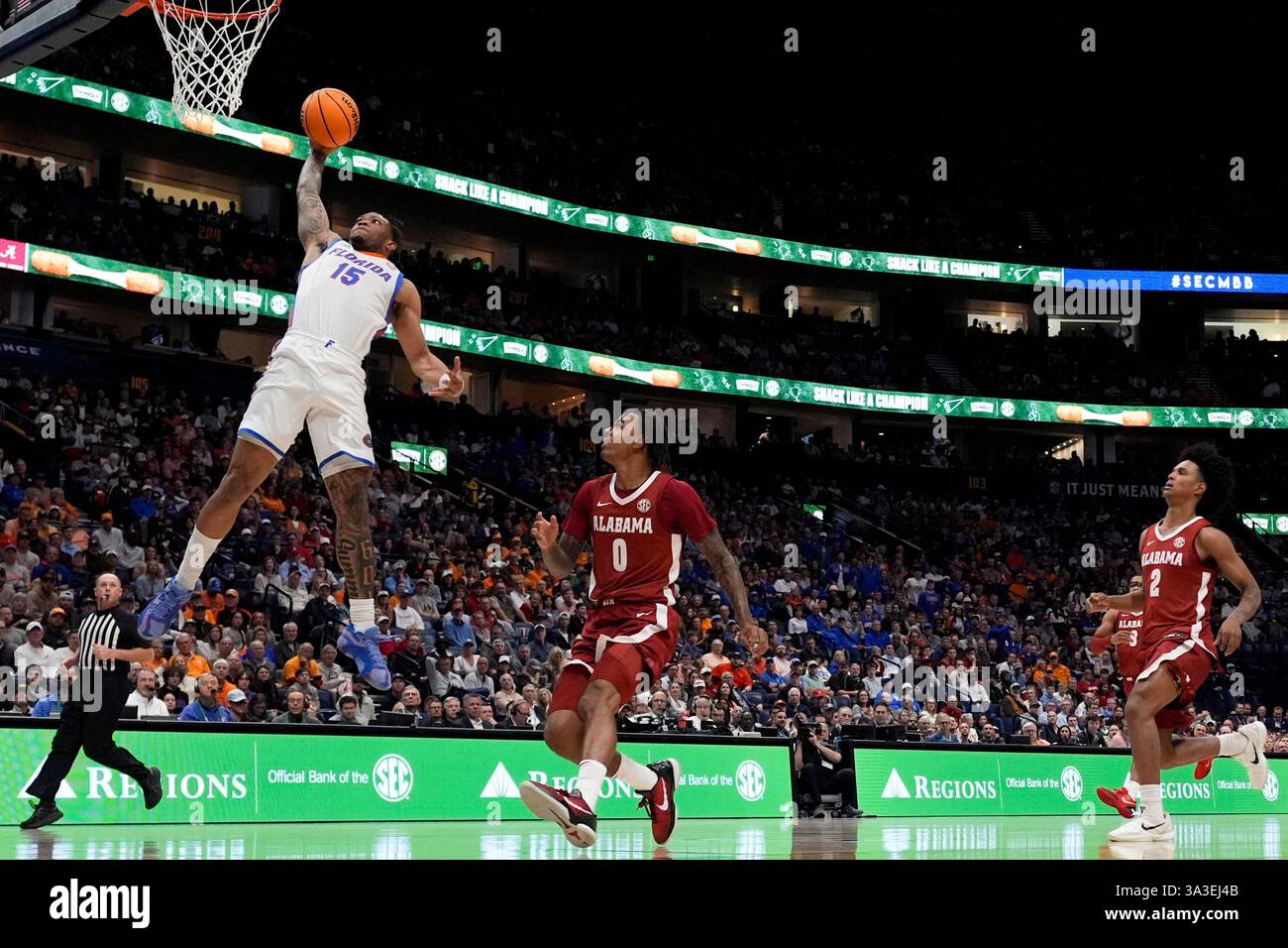 Florida guard Alijah Martin (15) dunks on Alabama guard Labaron Philon ...