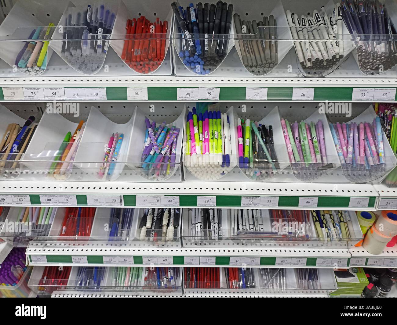 Diverse collection of pens and markers organized on store shelf Stock ...