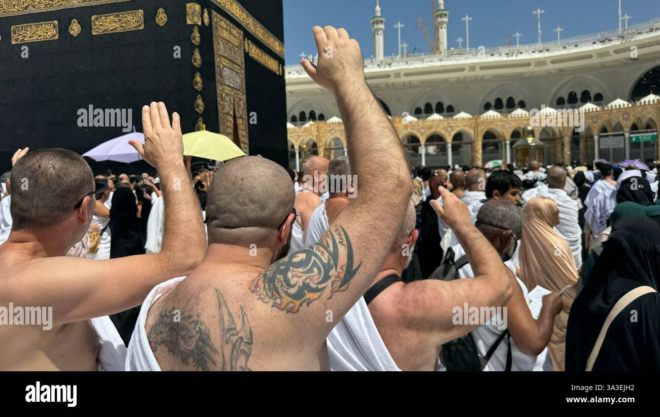 Muslim pilgrims perform Tawaf around the Kaaba after dawn prayer at ...