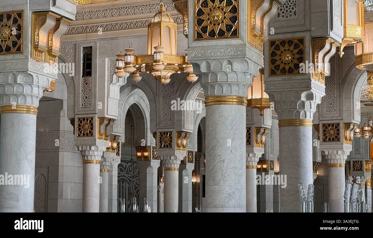A Muslim pilgrim praying inside the grand Masjid al-Haram in Mecca ...