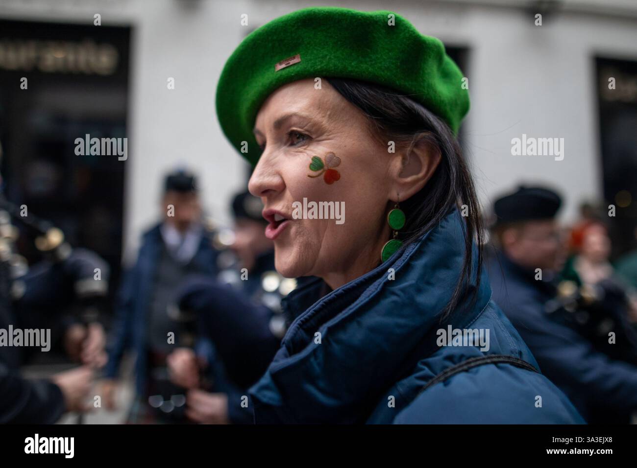 Madrid, Spain. 15th Mar, 2025. A woman wearing a green beret with a ...