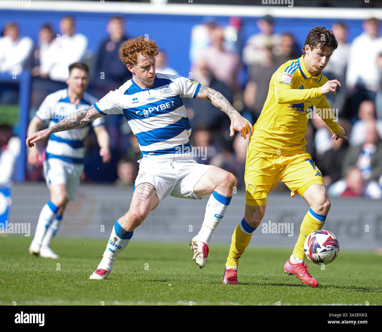 Jack Colback of Queens Park Rangers attempts to tackle Brenden Aaronson ...