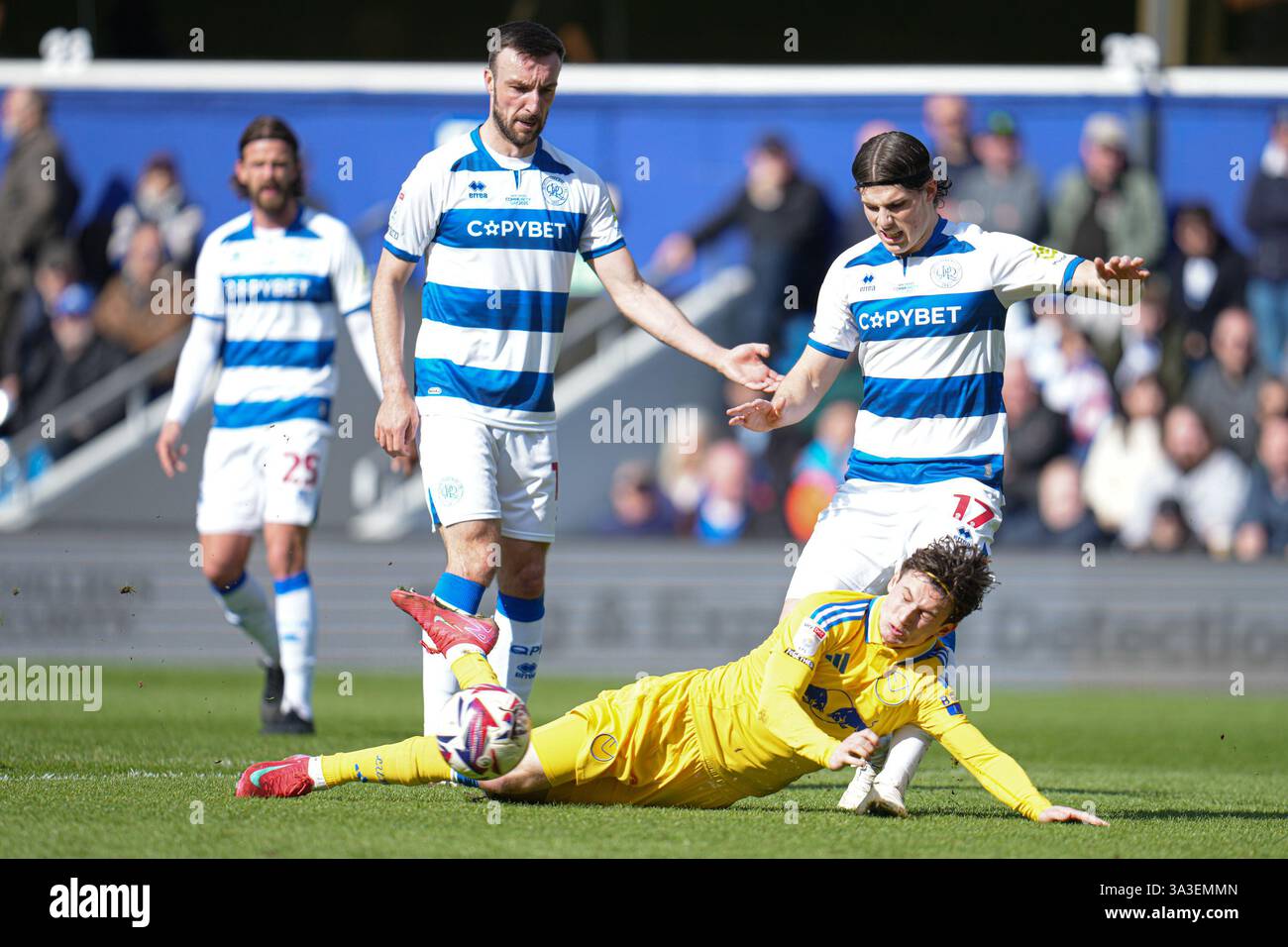 Brenden Aaronson of Leeds United jumps in front of ball in an attempt ...
