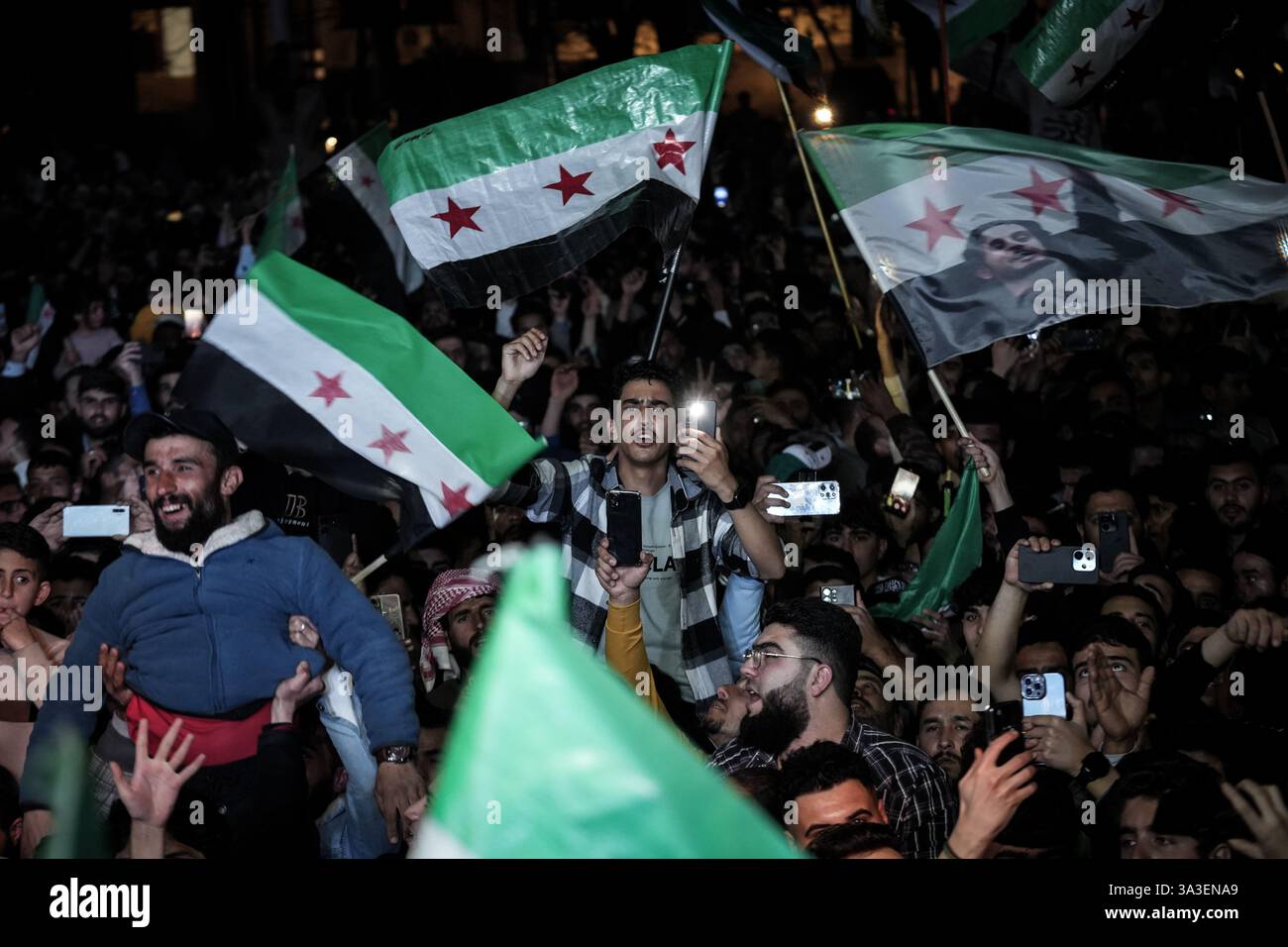 Homs, Syria. 15th Mar, 2025. Syrians gather at Tahrir Square (formerly ...