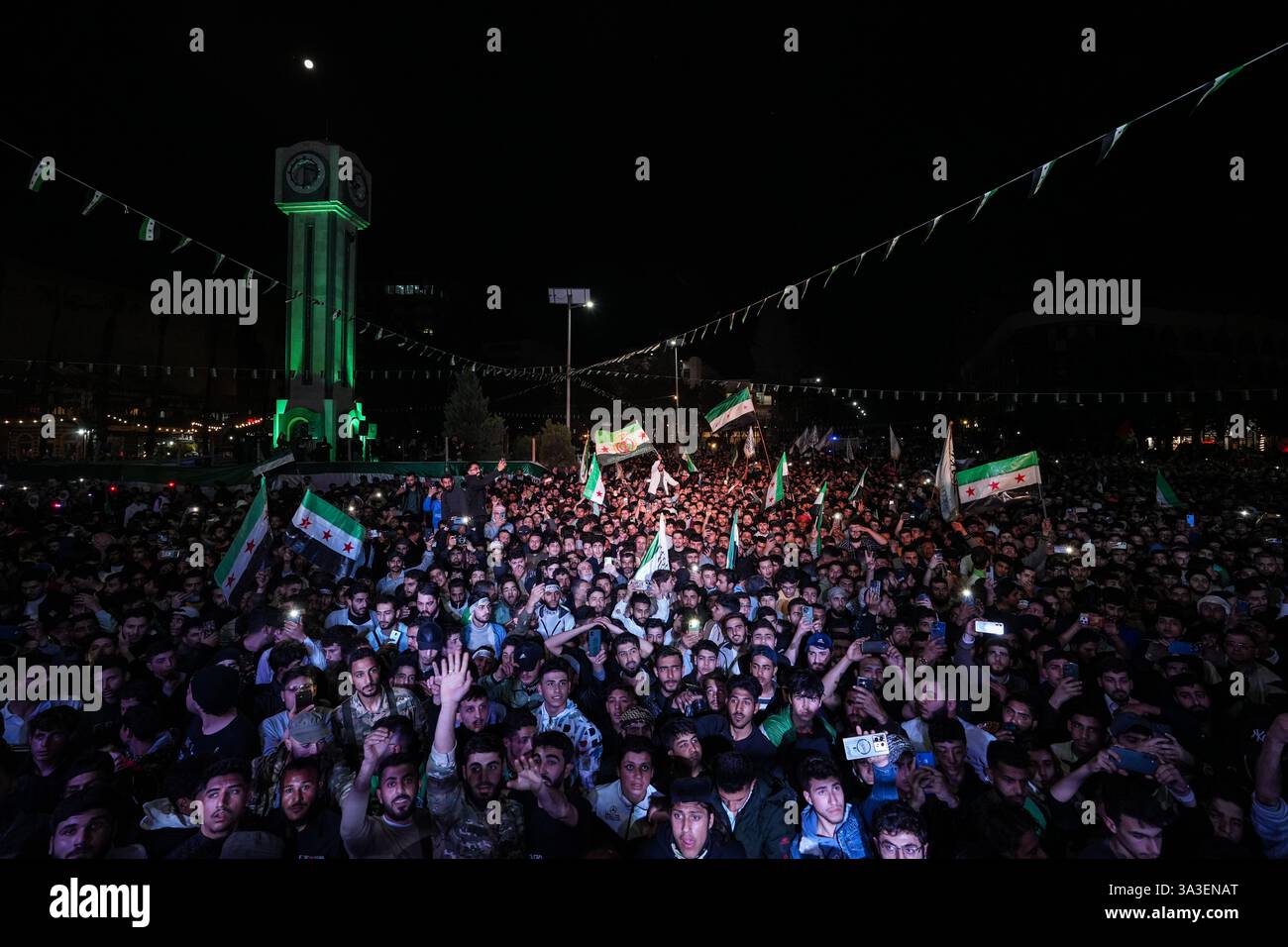 15 March 2025, Syria, Homs: Syrians gather at Tahrir Square (formerly ...