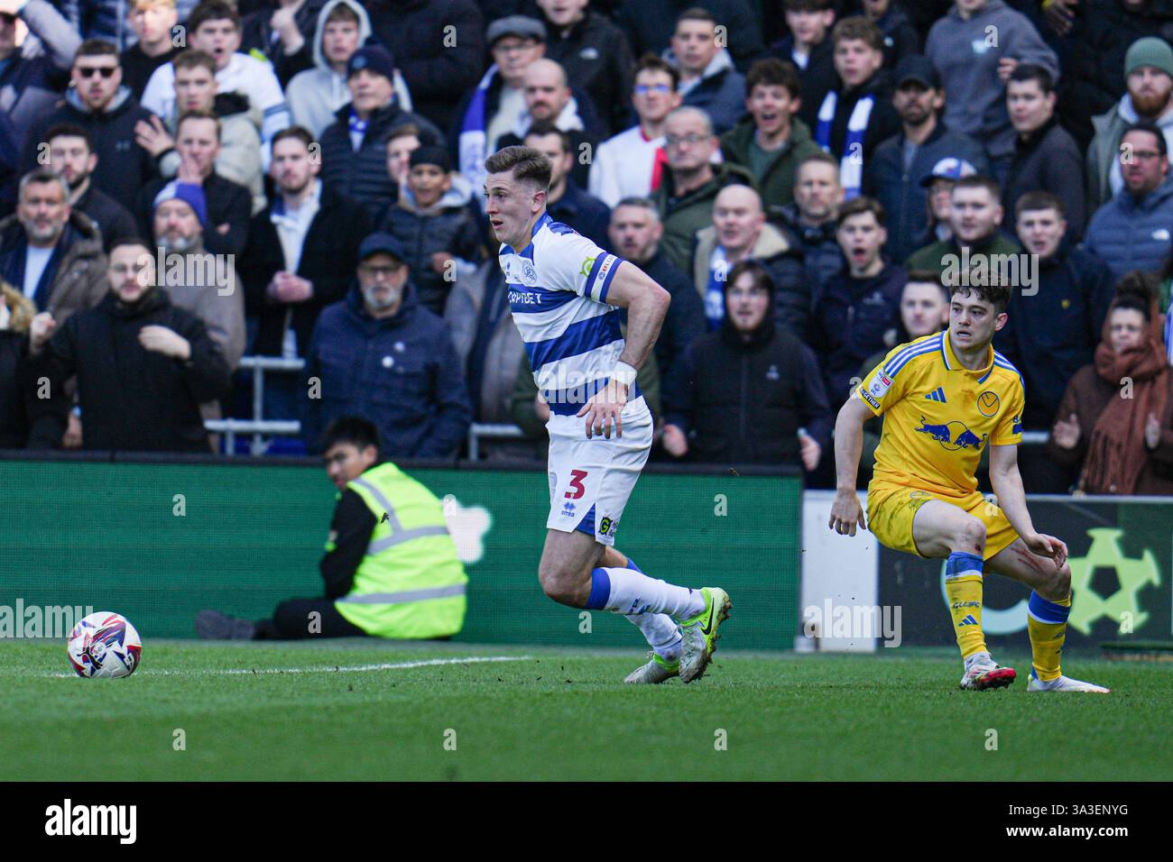 Jimmy Dunne of Queens Park Rangers gets past Daniel James of Leeds ...