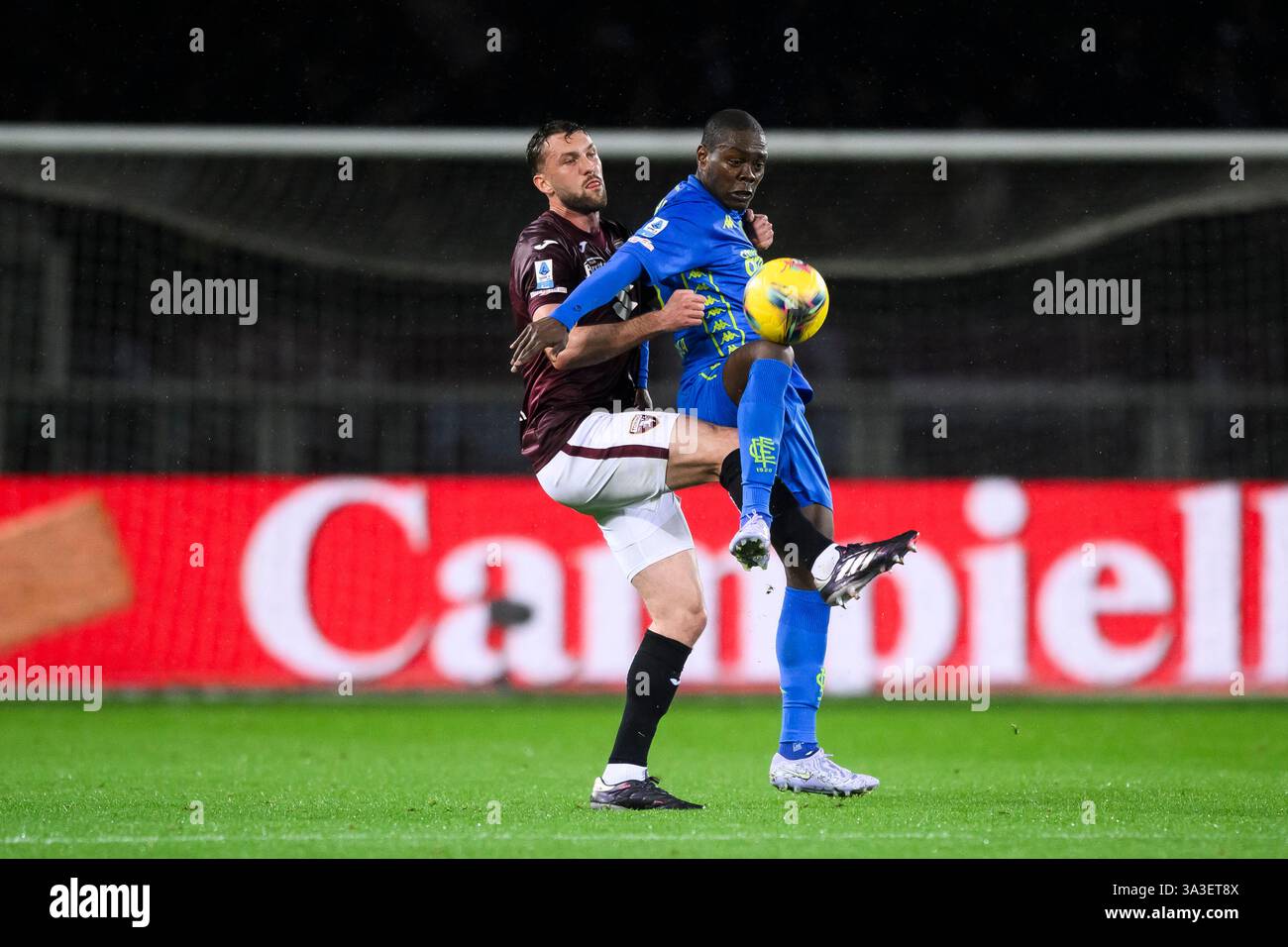 Turin, Italy. 15 March 2025. Emmanuel Gyasi of Empoli FC competes for ...