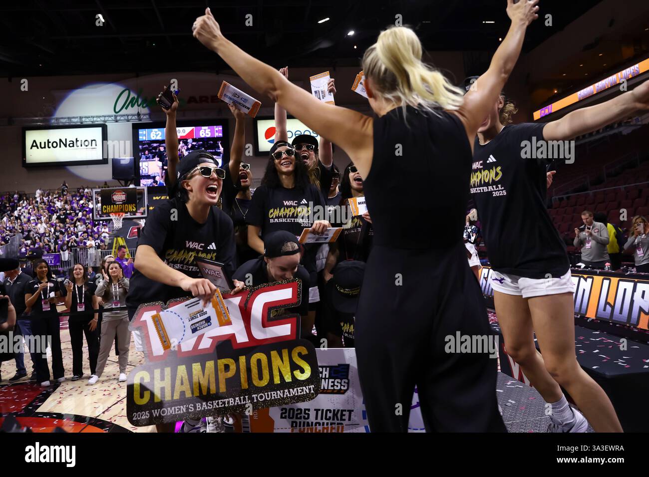 Grand Canyon head coach Molly Miller, foreground, celebrates with her ...