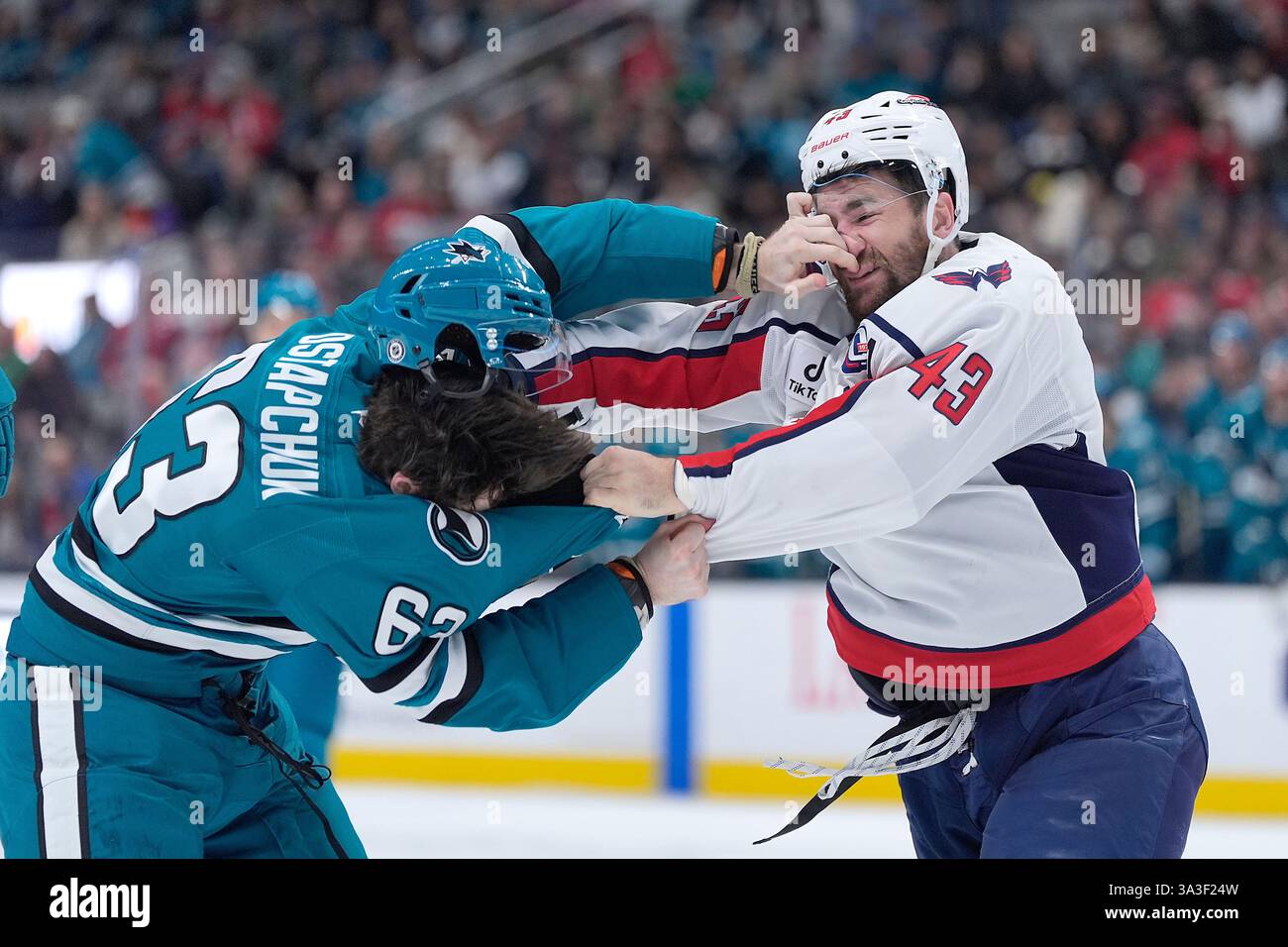 Washington Capitals right wing Tom Wilson (43) fights with San Jose ...