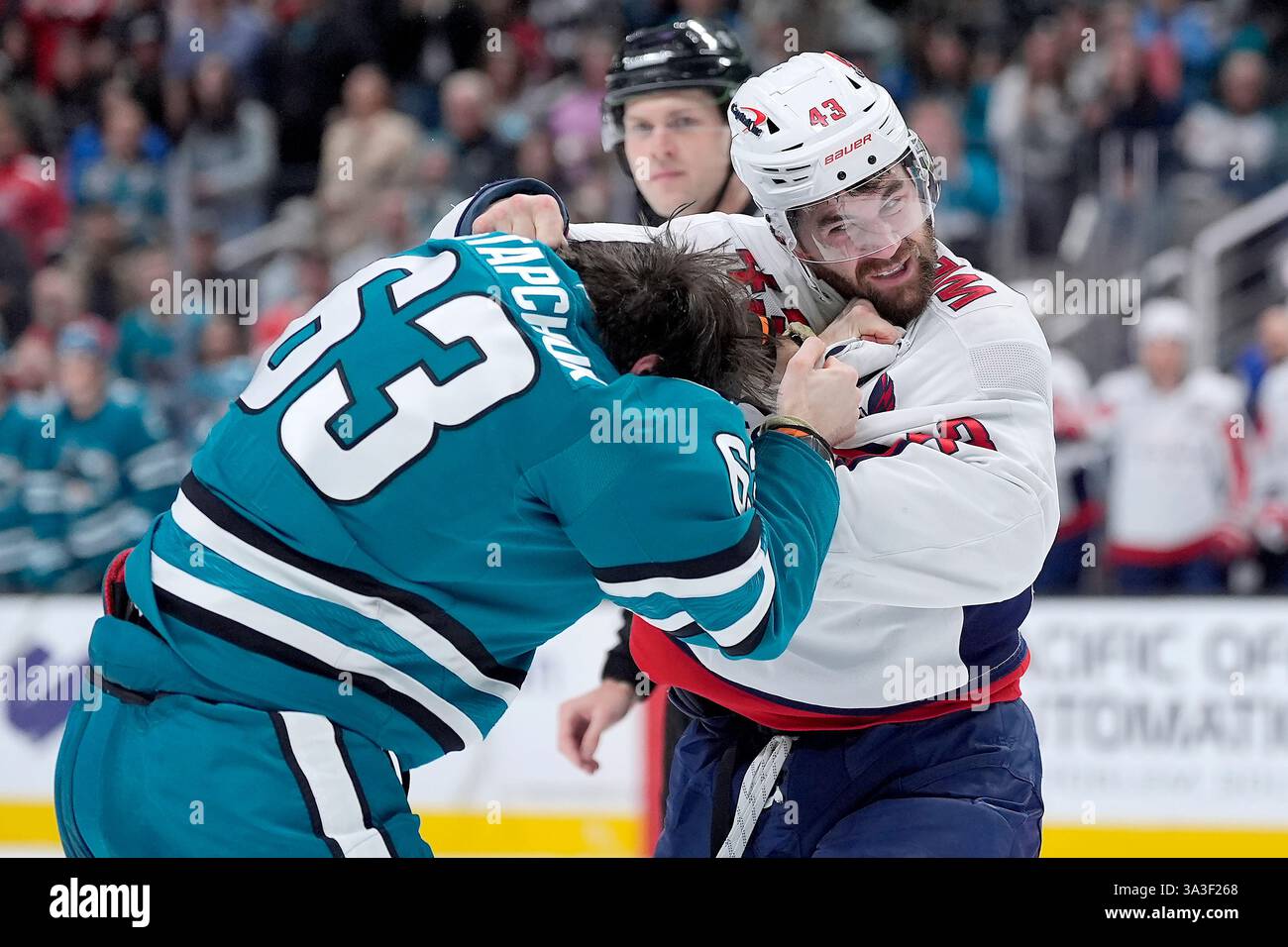 Washington Capitals right wing Tom Wilson (43) fights with San Jose ...