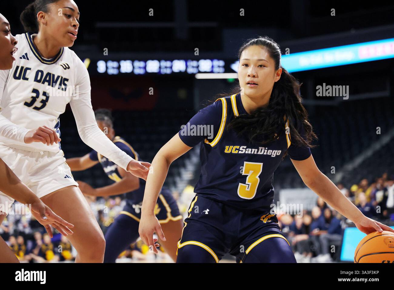 UC San Diego guard Sumayah Sugapong (3) controls the ball near UC Davis ...