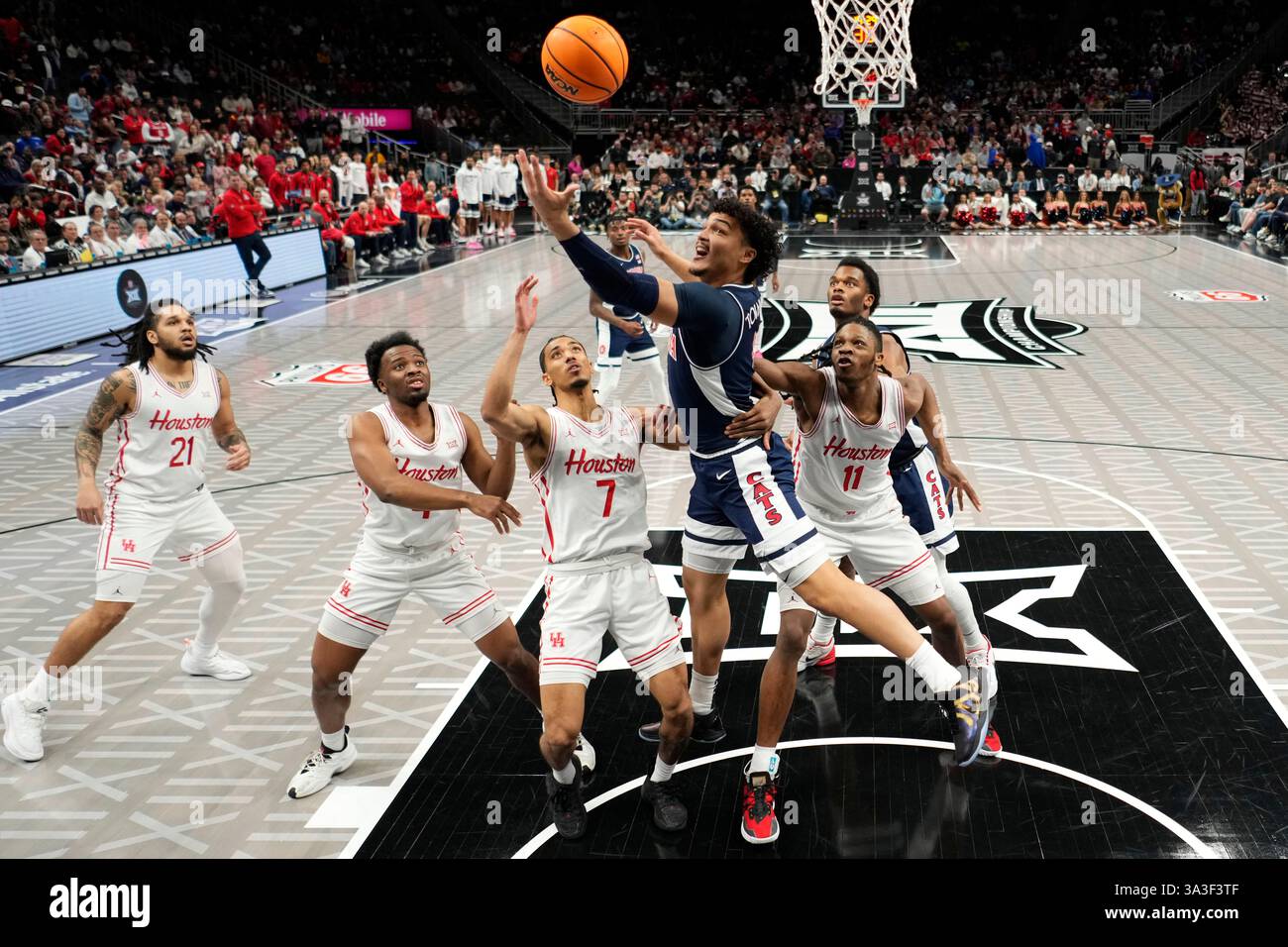 Arizona forward Trey Townsend (4) puts up a shot during the first half ...