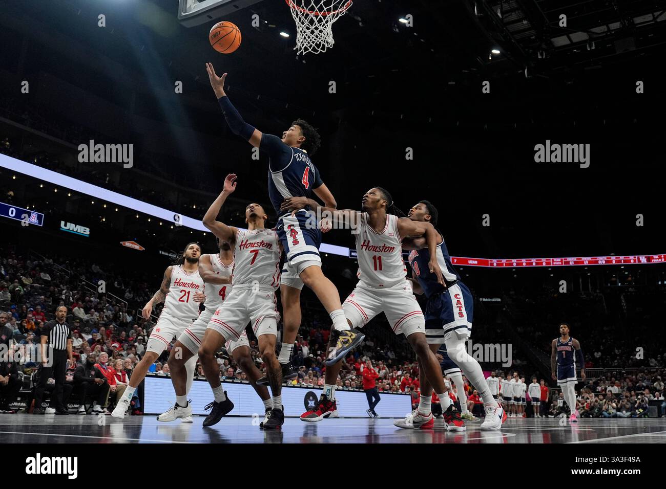Arizona forward Trey Townsend (4) puts up a shot during the first half ...