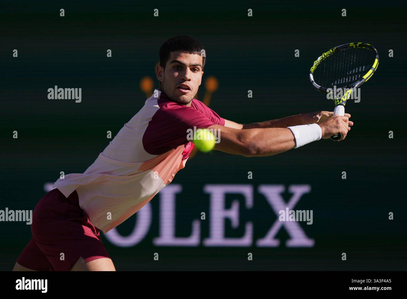 Carlos Alcaraz, of Spain, returns to Jack Draper, of Great Britain ...