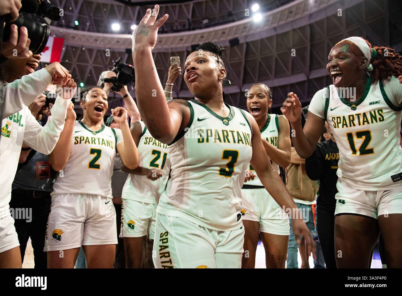 Norfolk State guard Diamond Johnson (3) dances and holds up three ...