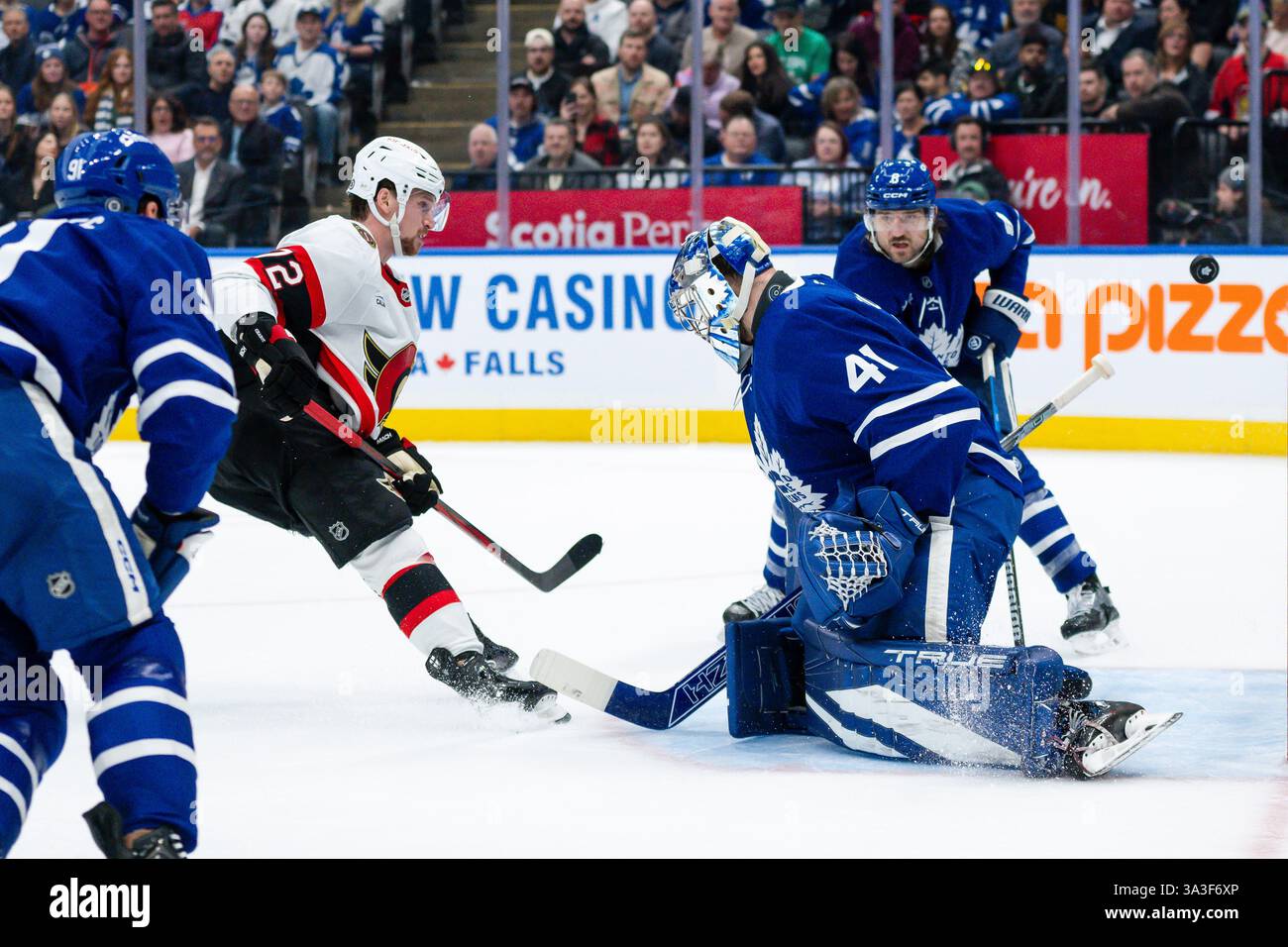 Ottawa Senators center Shane Pinto (12) shoots on Toronto Maple Leafs ...