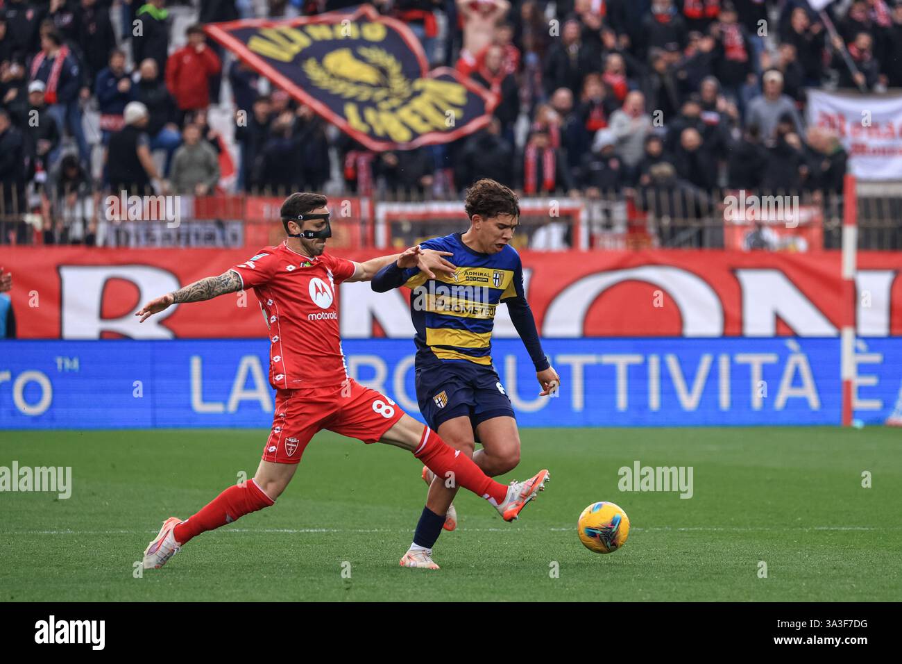 Monza, Italy. 15th Mar, 2025. Anas Haj Mohamed (Parma Calcio) fights ...