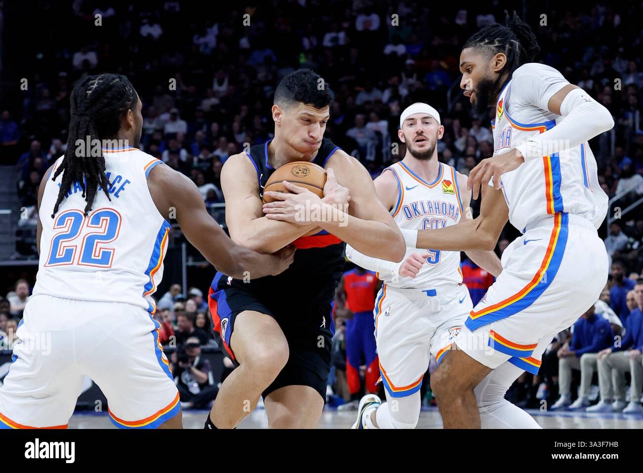 Detroit Pistons forward Simone Fontecchio, second from left, drives to ...