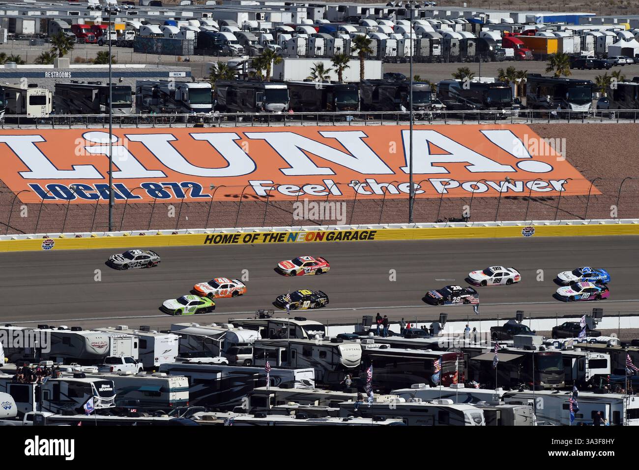 LAS VEGAS, NV - MARCH 15: A pack of cars drive until the LiUNA banner ...