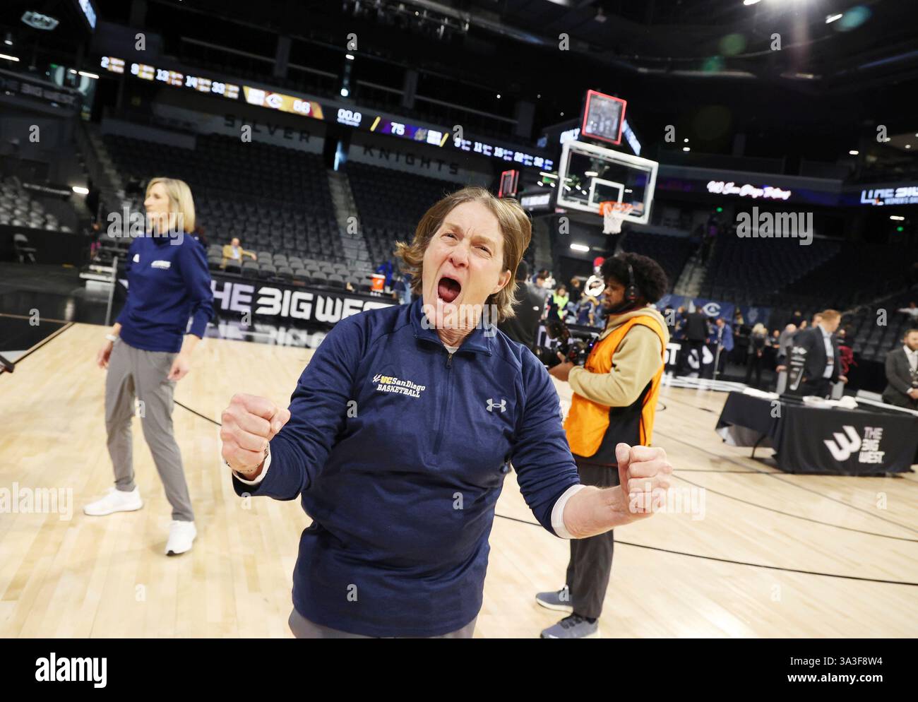 UC San Diego head coach Heidi VanDerveer cheers after defeating UC ...