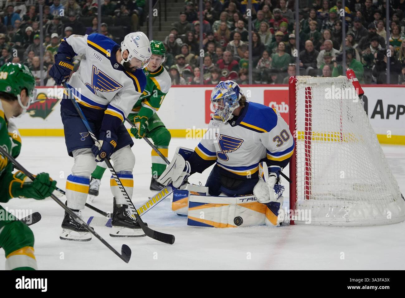 St. Louis Blues goaltender Joel Hofer (30) stops a shot during the ...