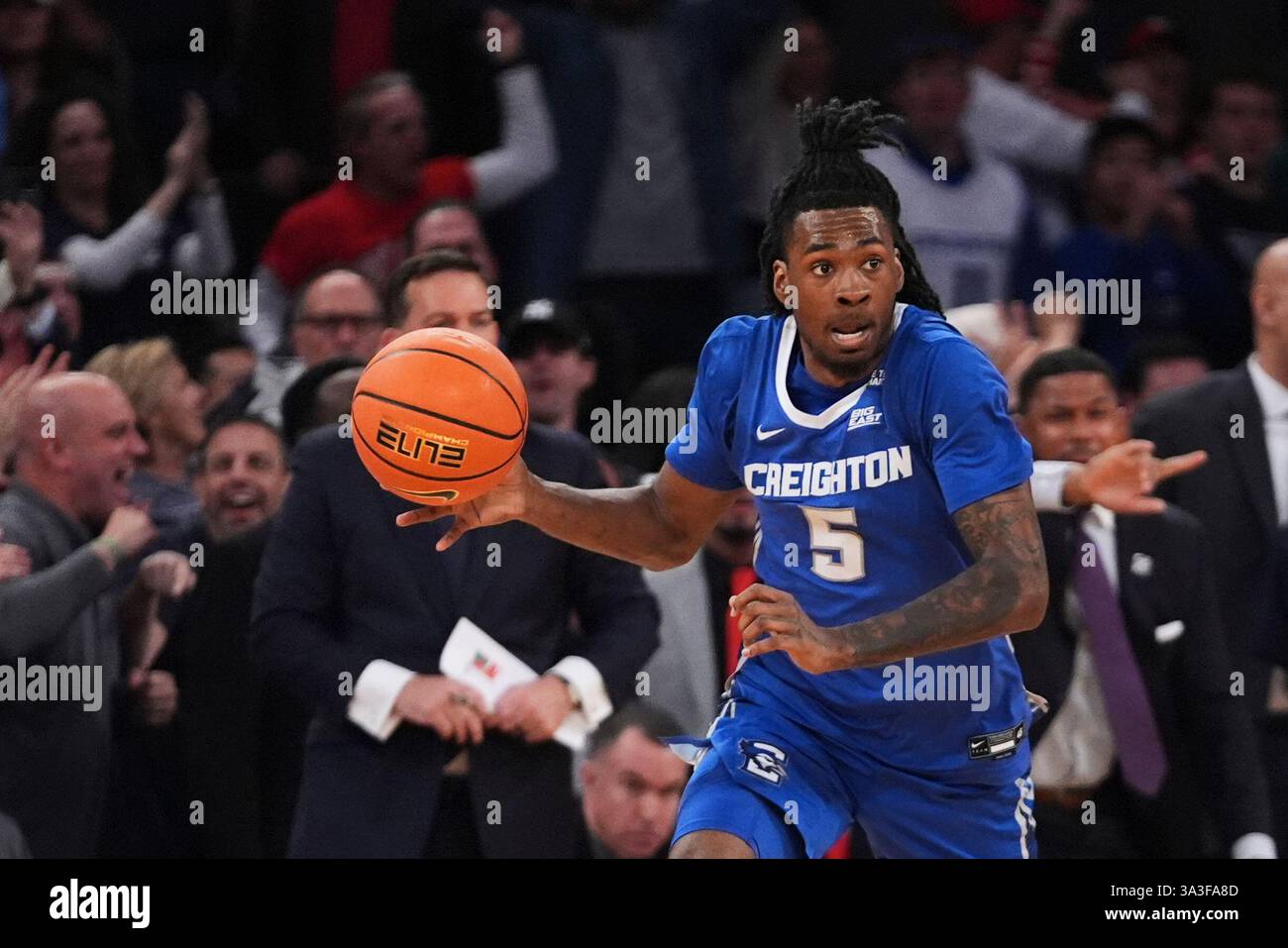 Creighton's Jamiya Neal (5) looks to pass during the second half of an ...
