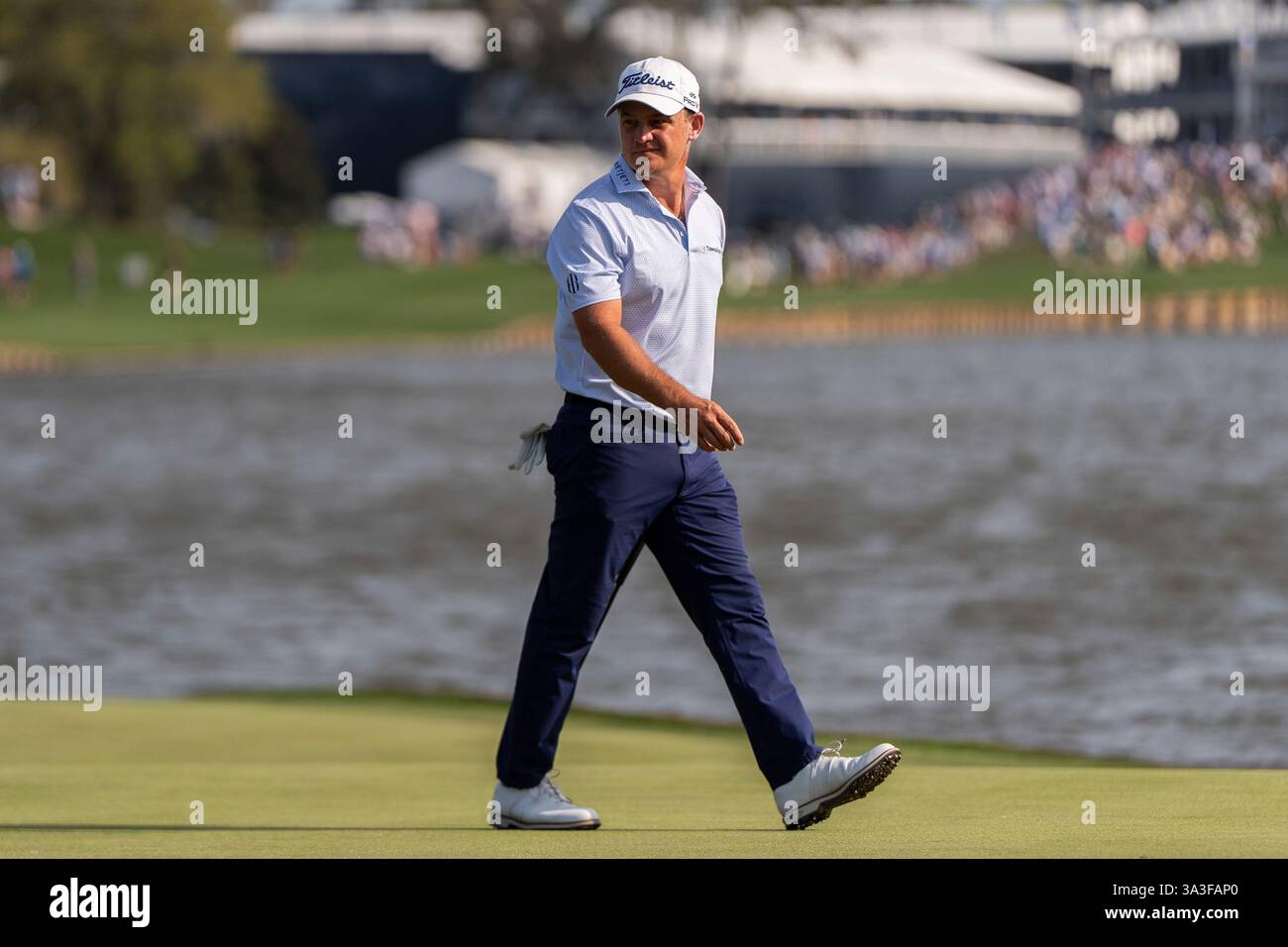 Bud Cauley looks over the 18th green during the third round of The ...