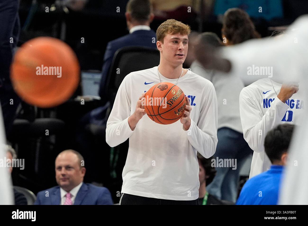 Duke forward Cooper Flagg watches before an NCAA college basketball ...