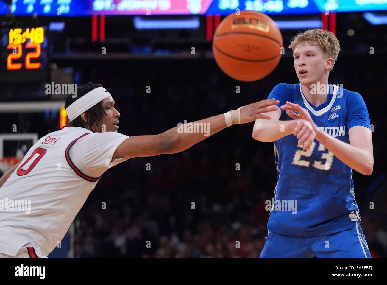 Creighton's Jackson McAndrew (23) passes away from St. John's Aaron ...