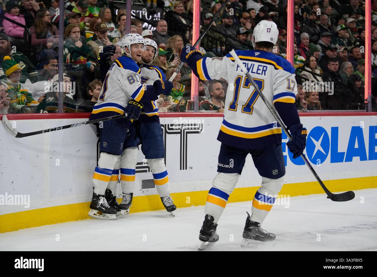 St. Louis Blues center Jordan Kyrou (25), middle, celebrates with ...