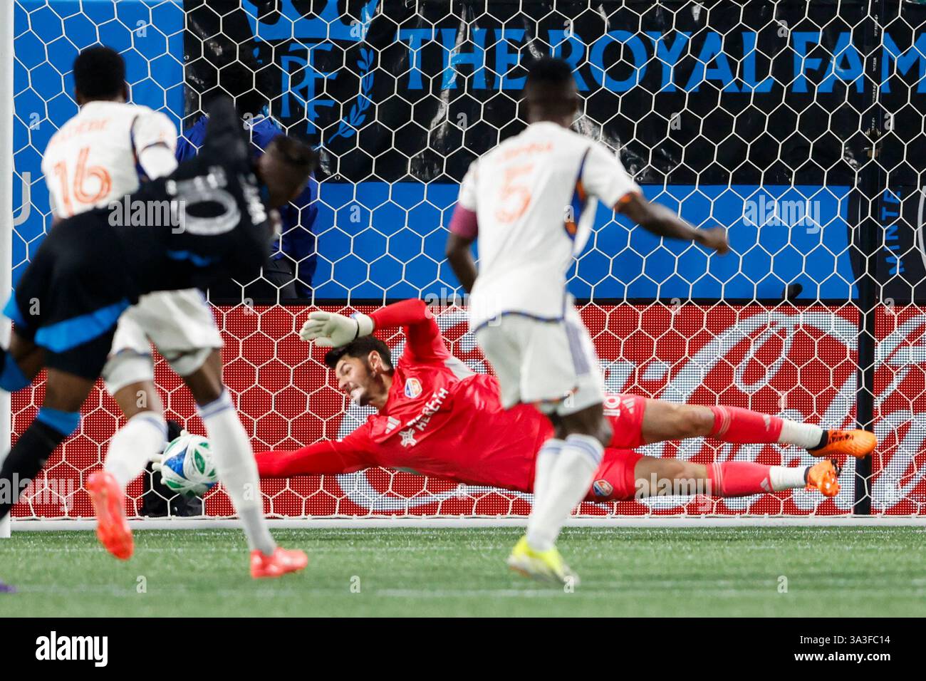 FC Cincinnati goalkeeper Roman Celentano (18) blocks a Charlotte FC ...