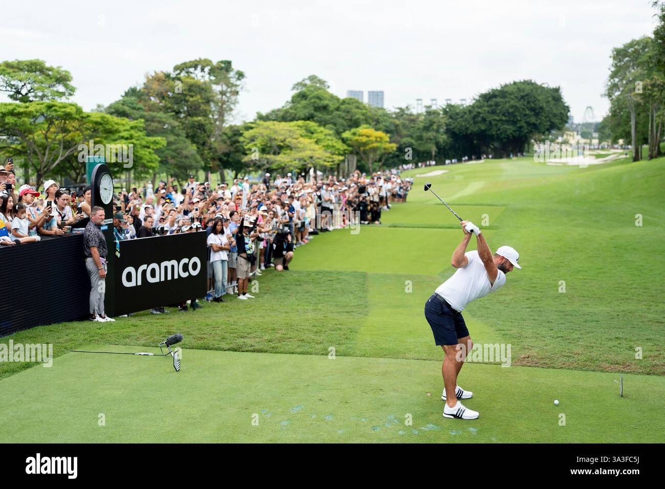 Captain Dustin Johnson of 4Aces GC hits his shot from the first tee ...