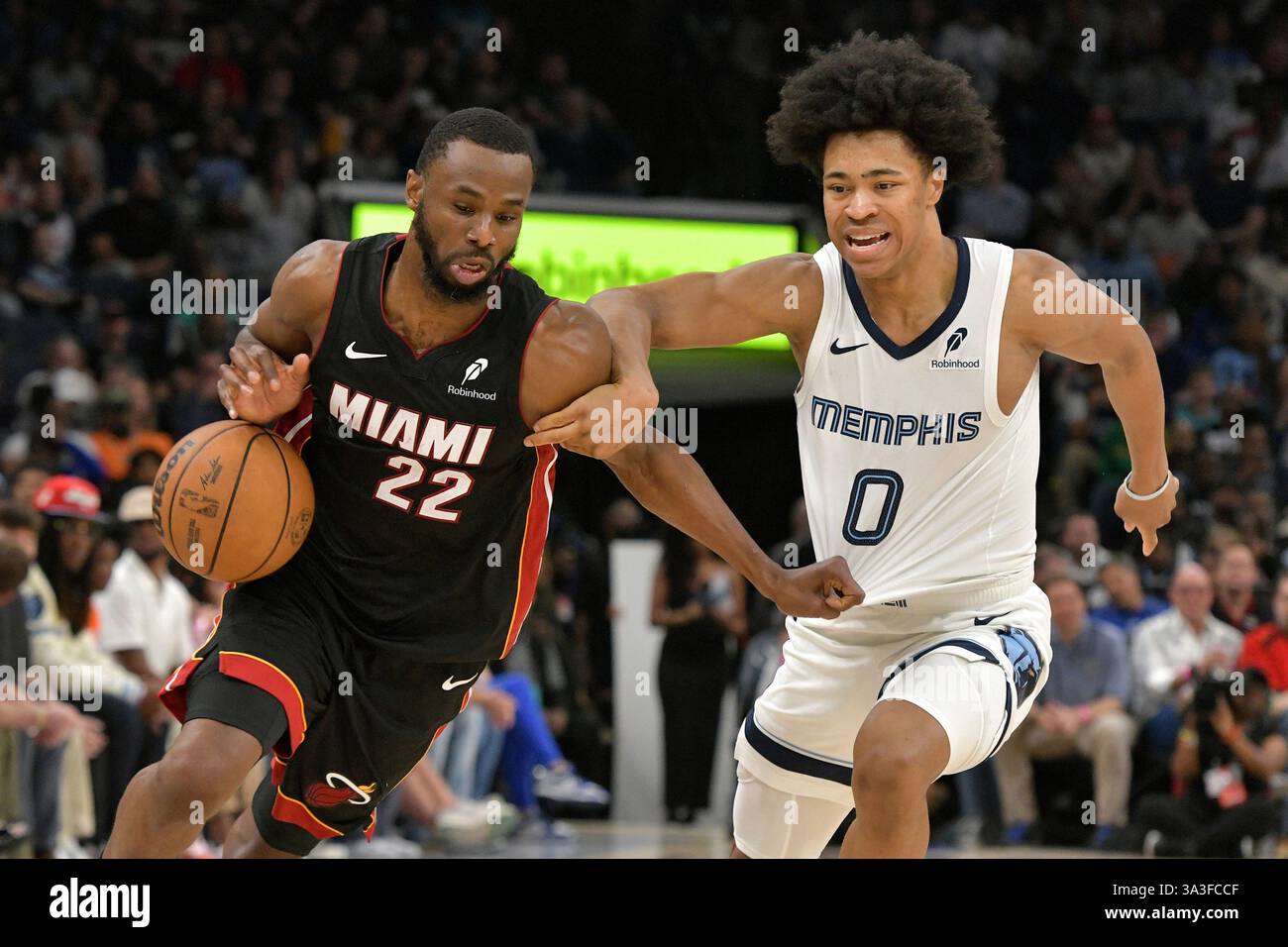 Miami Heat forward Andrew Wiggins (22) handles the ball against Memphis ...