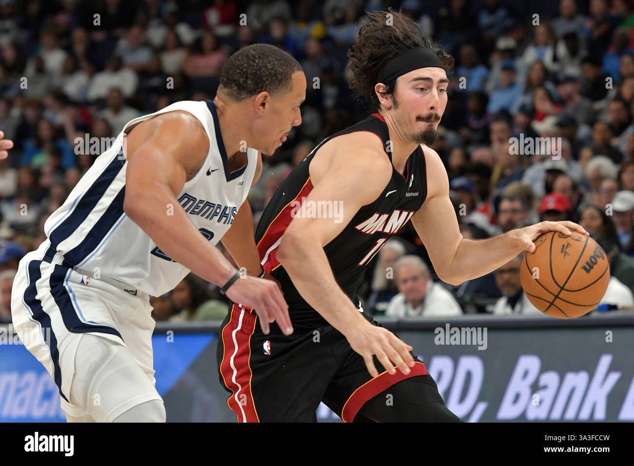 Miami Heat guard Jaime Jaquez Jr., right, handles the ball against ...