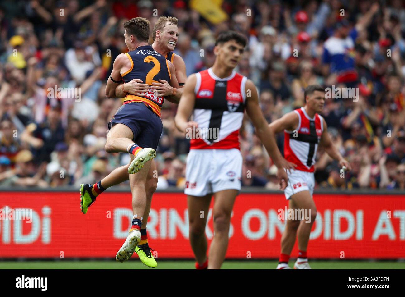 Jordan Dawson of the Crows celebrates a goal with Ben Keays during the ...