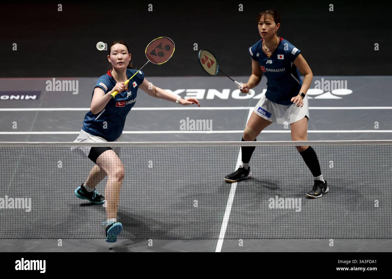(250316) -- BIRMINGHAM, March 16, 2025 (Xinhua) -- Fukushima Yuki/Matsumoto Mayu (L) compete ...