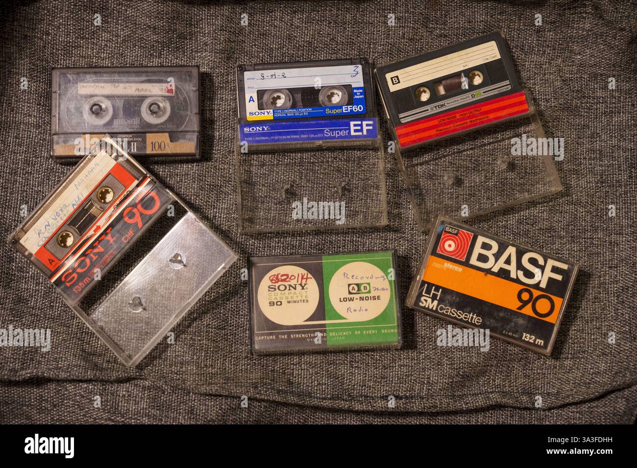 Old cassette tapes are arranged for a photograph inside a house in ...