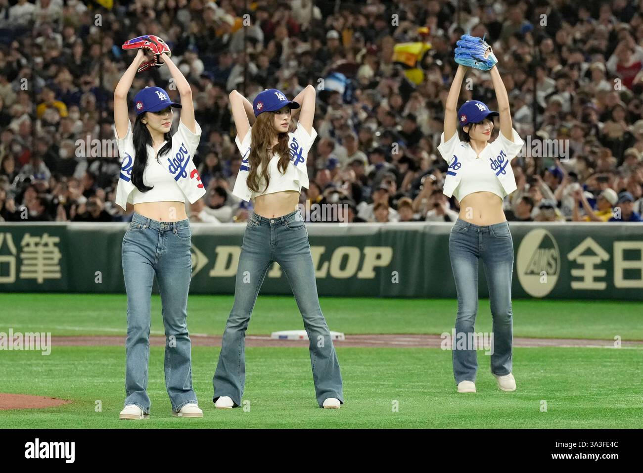 Members of MISAMO, a subunit of the K-pop girl group TWICE, throw out ...