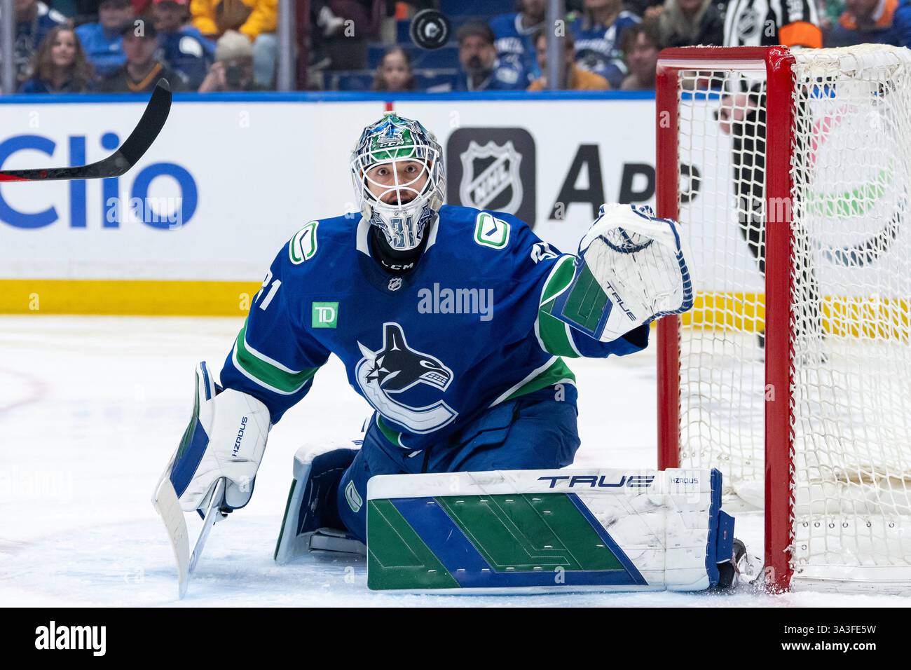 Vancouver Canucks goaltender Arturs Silovs (31) watches the puck during ...